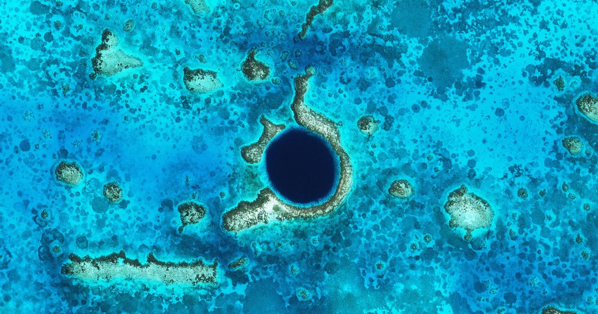 “The Great Blue Hole is a marine sinkhole off the coast of Belize. Now ...